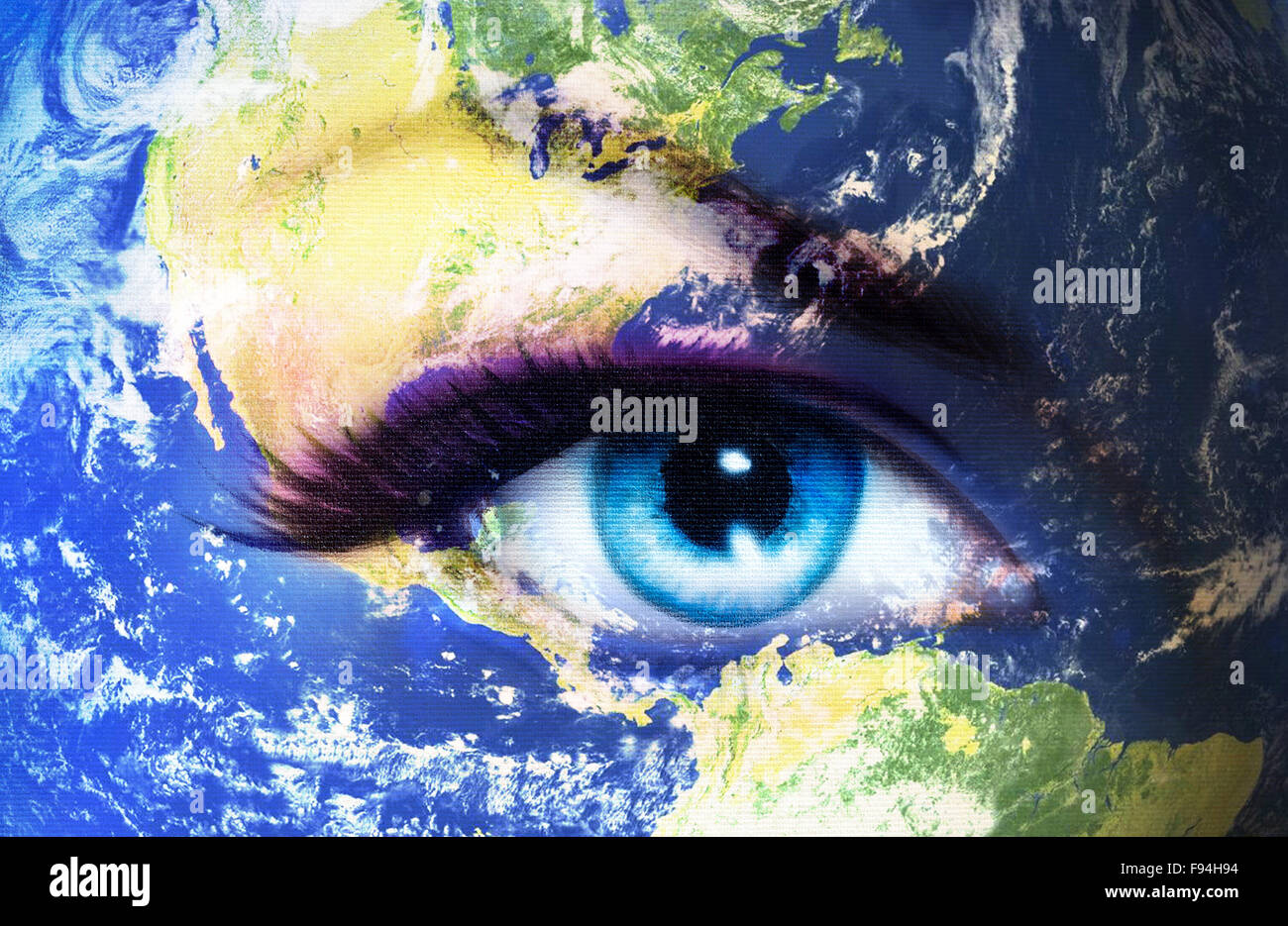 Planet Earth and blue human eye with violet day makeup. woman painting ...