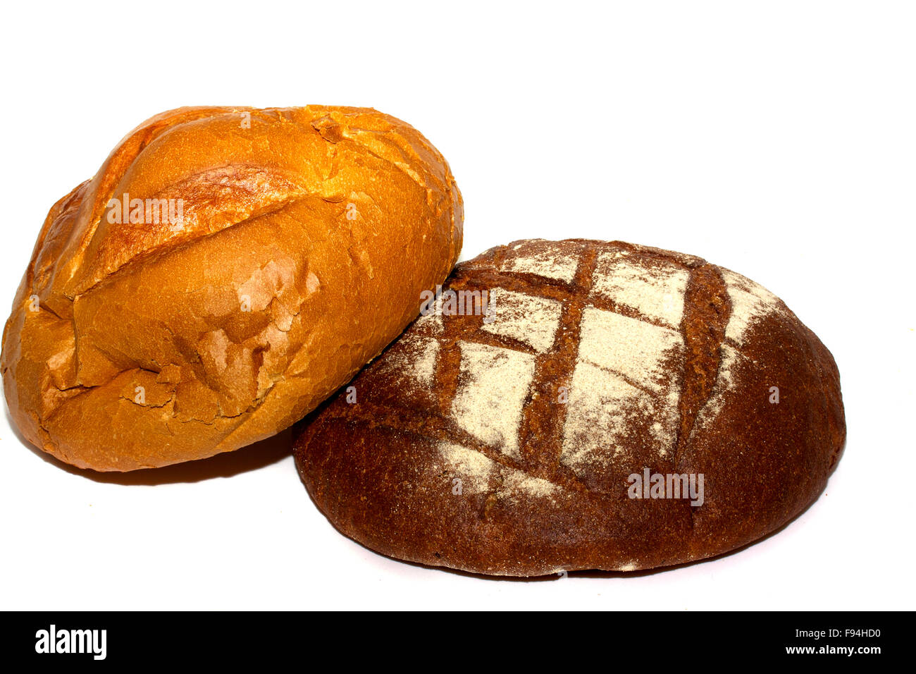 loafs of whole wheat and rye bread and isolated on white background ...