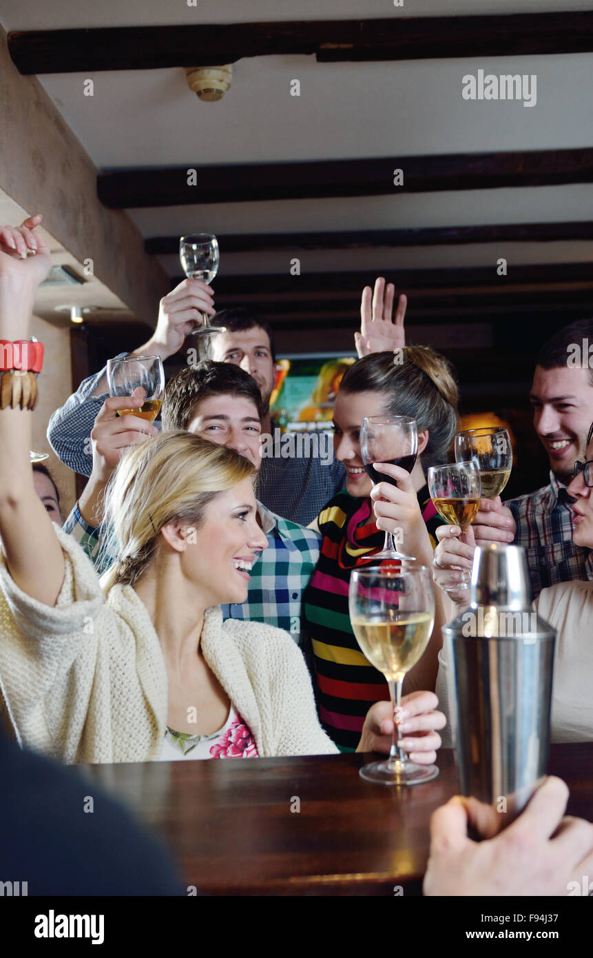Group of happy young people drink wine at party disco restaurant Stock ...