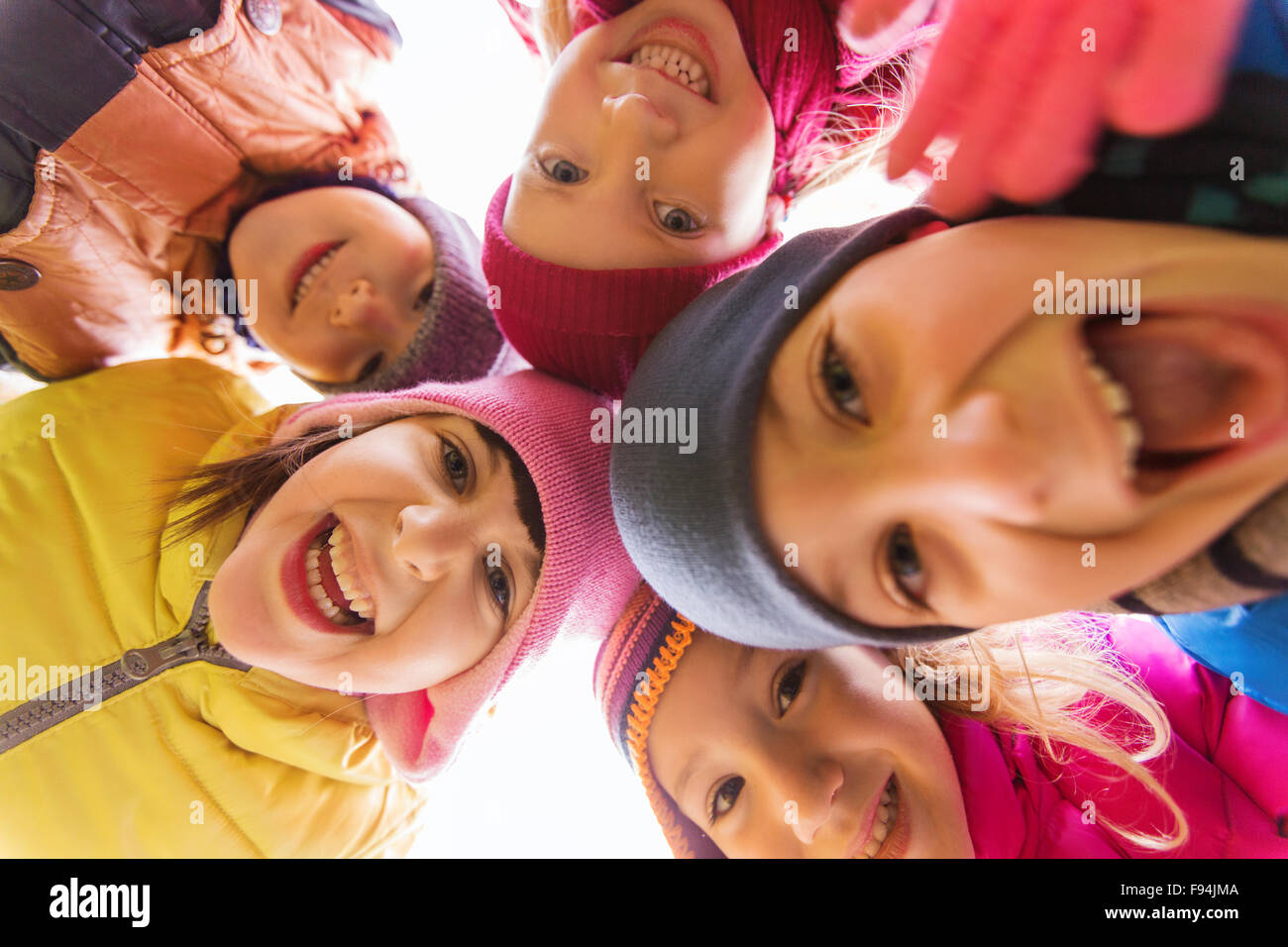 group of happy children faces in circle Stock Photo - Alamy