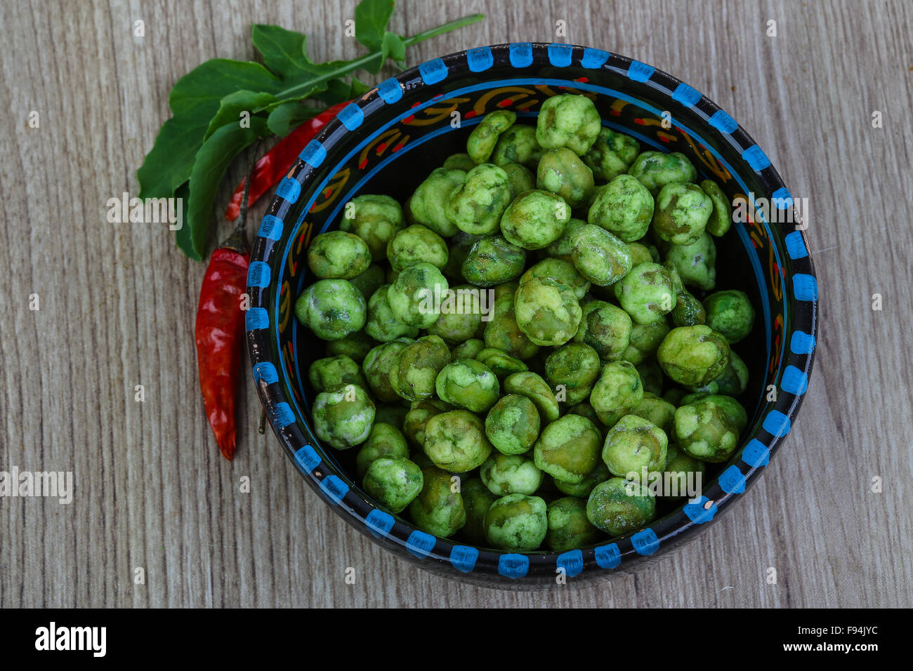 Japan traditional cuisime - Wasabi peas on the wood background Stock ...