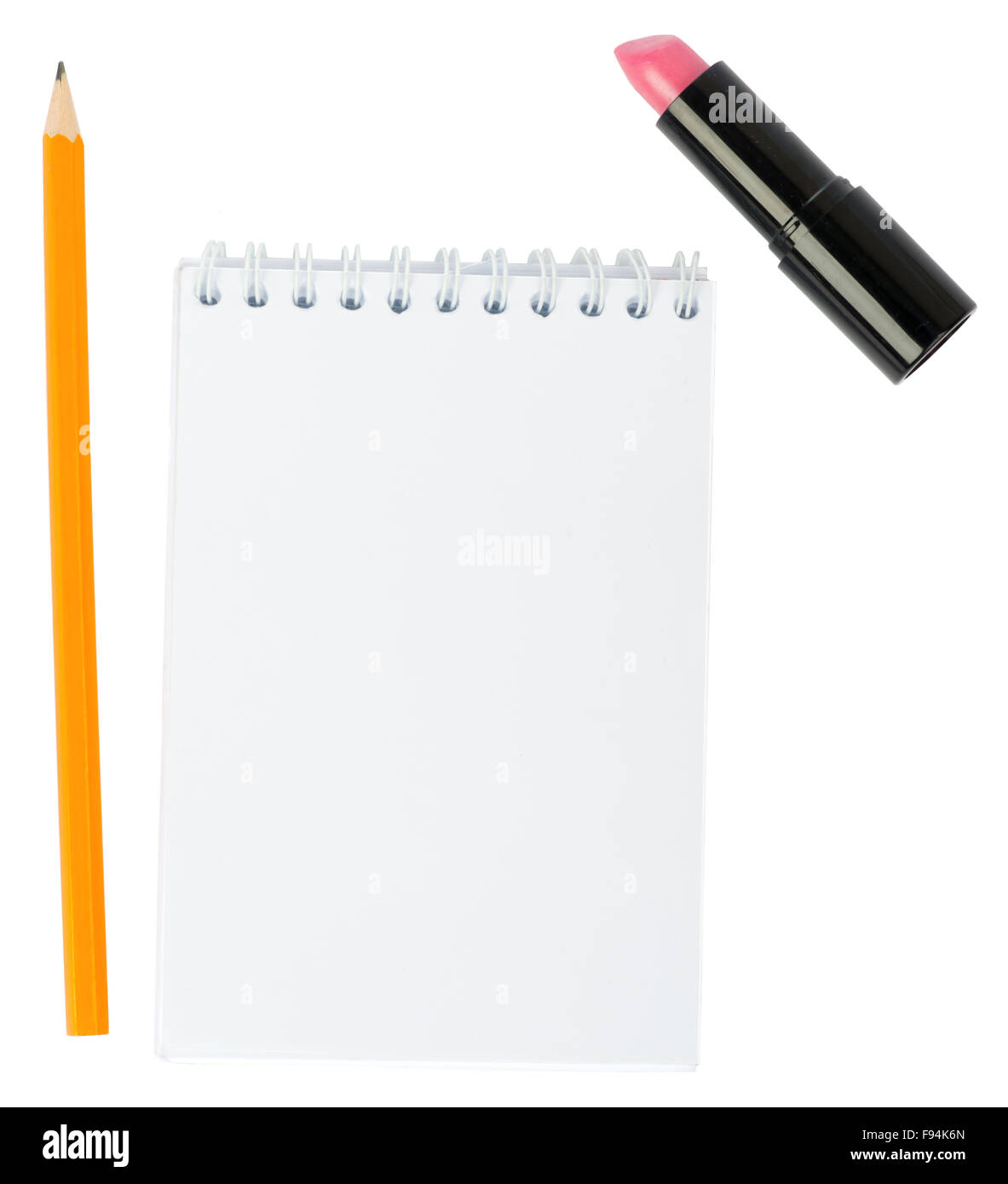 Open copybook with lipstick Stock Photo - Alamy