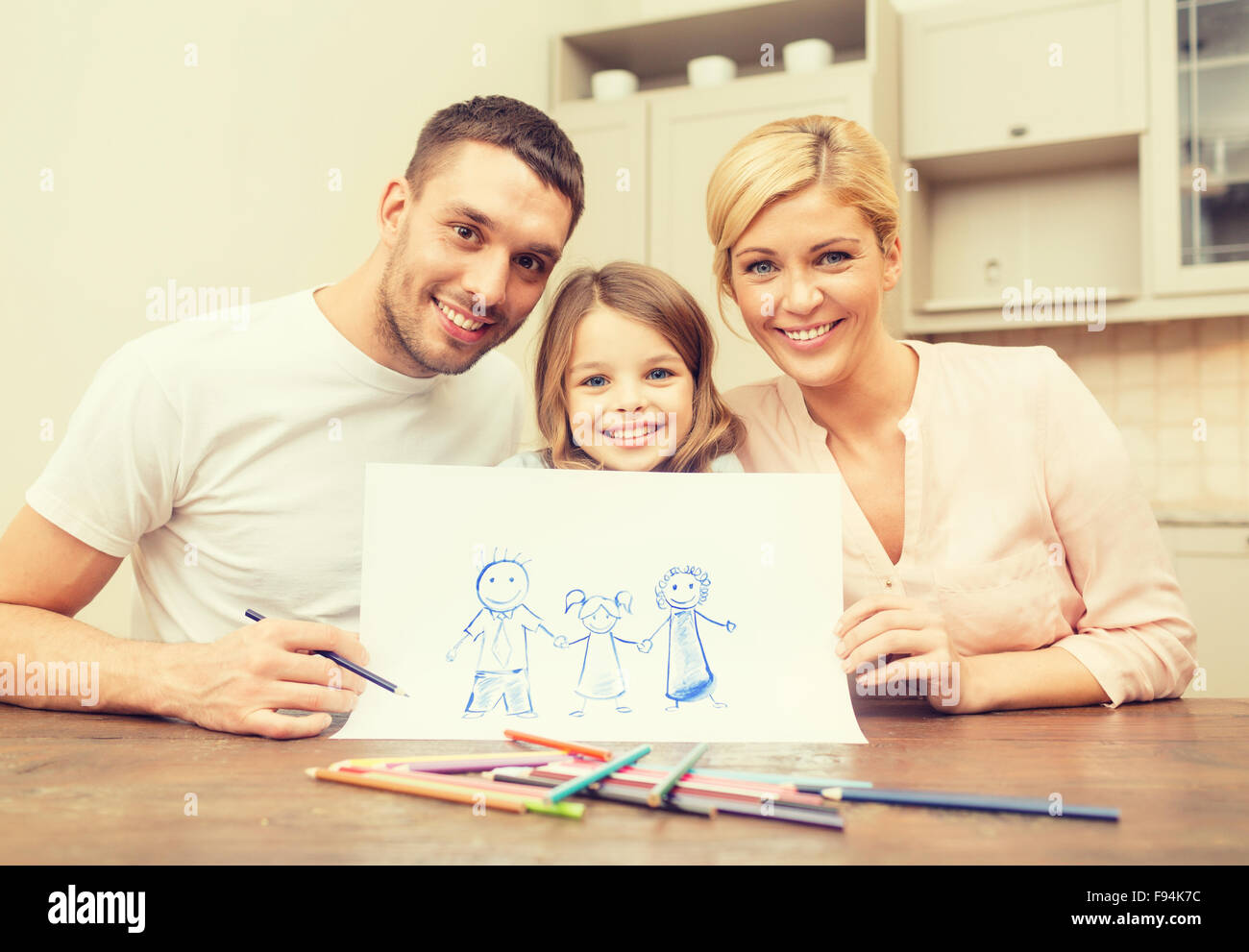 happy family drawing at home Stock Photo - Alamy