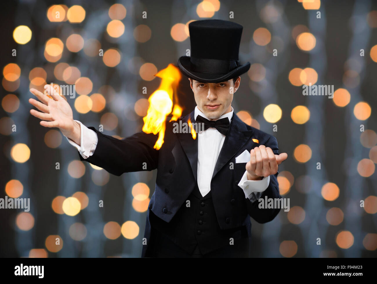 magician in top hat showing trick Stock Photo - Alamy