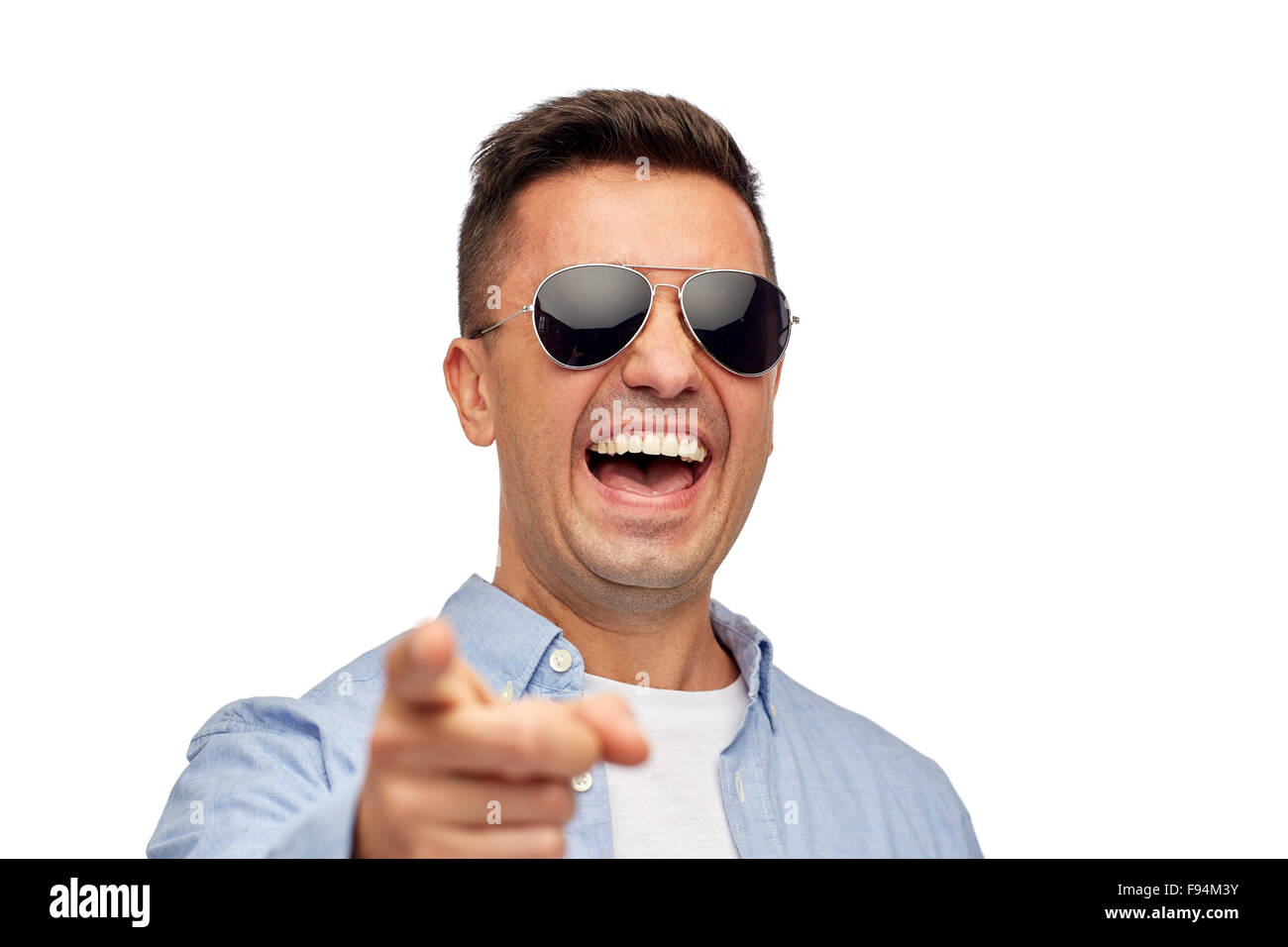 Laughing man pointing finger hi-res stock photography and images - Alamy