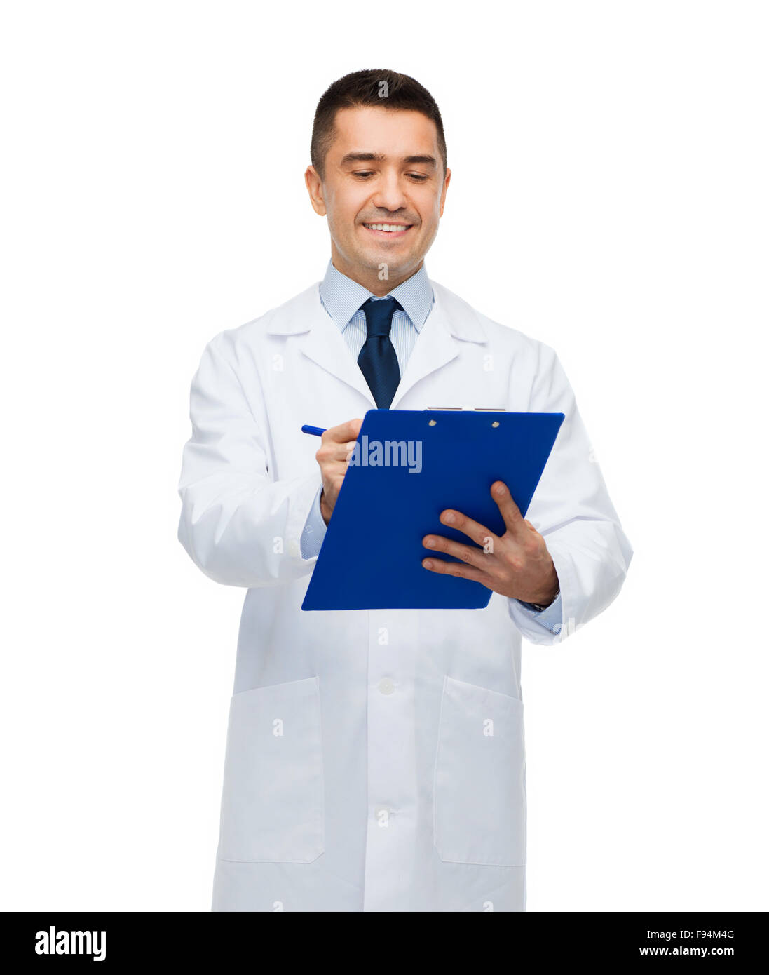 Smiling doctor holding notes hi-res stock photography and images - Alamy