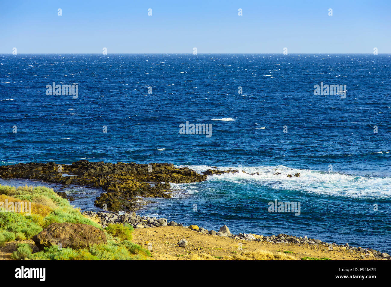 Stone Coast of Ocean with Waves and Sky on Tenerife Island at Day Stock ...
