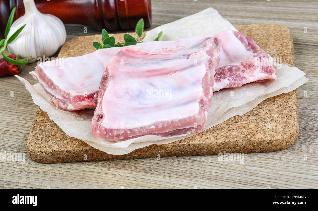Raw pork ribs with herbs and spices ready for cooking Stock Photo - Alamy