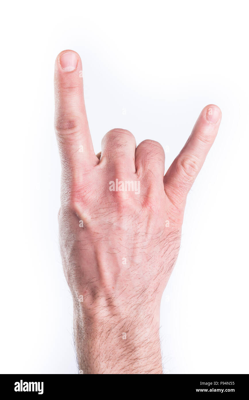 Man's hand miming horns on white background Stock Photo - Alamy