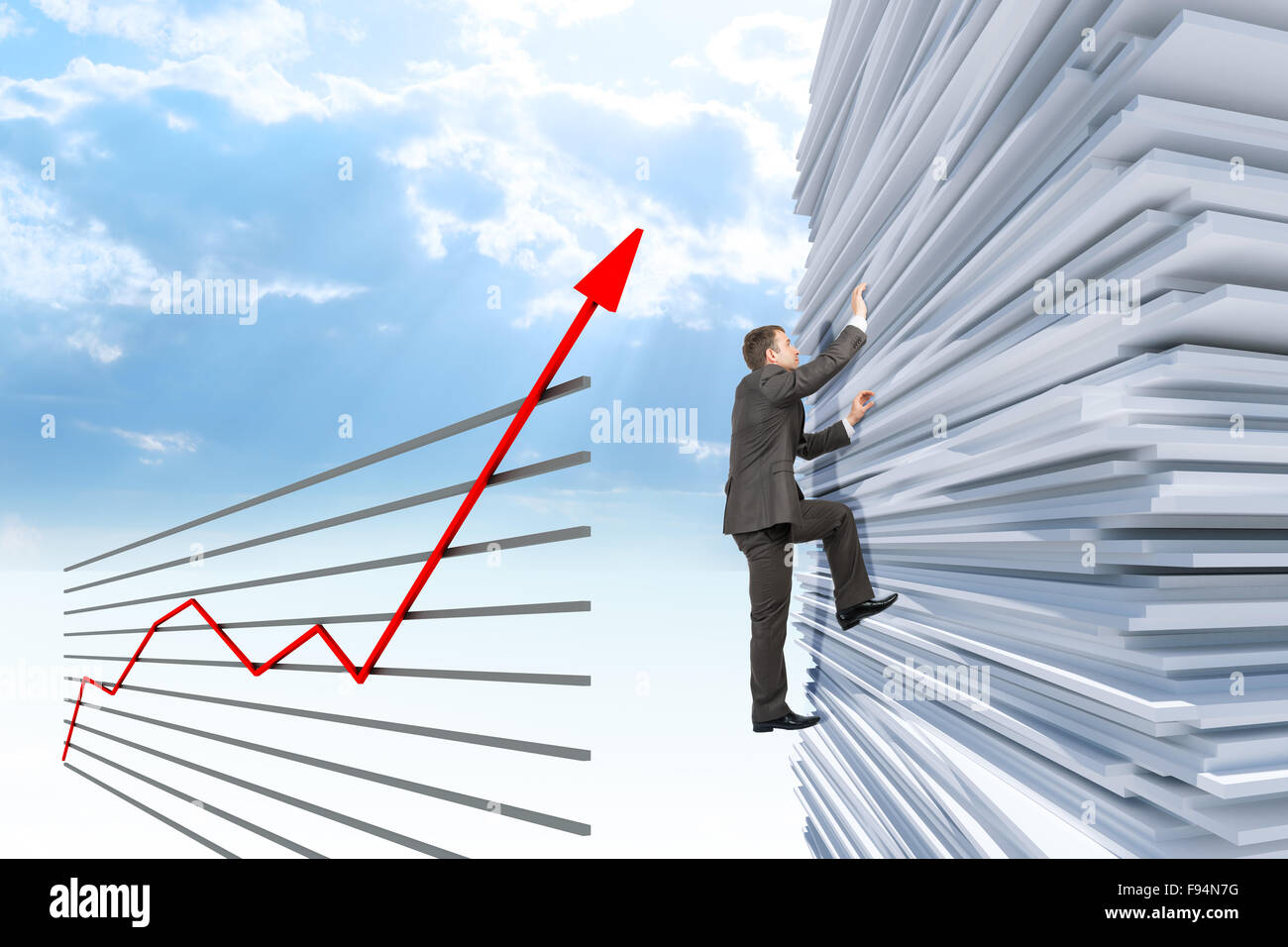 Businessman climbing up a huge stack of paper Stock Photo - Alamy