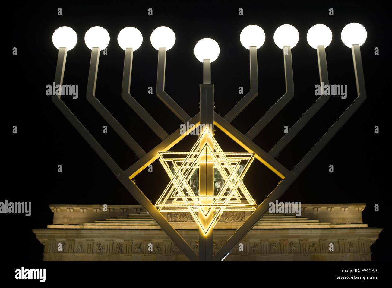 All the lights on the menorah are lit in front of the Brandenburg Gate ...