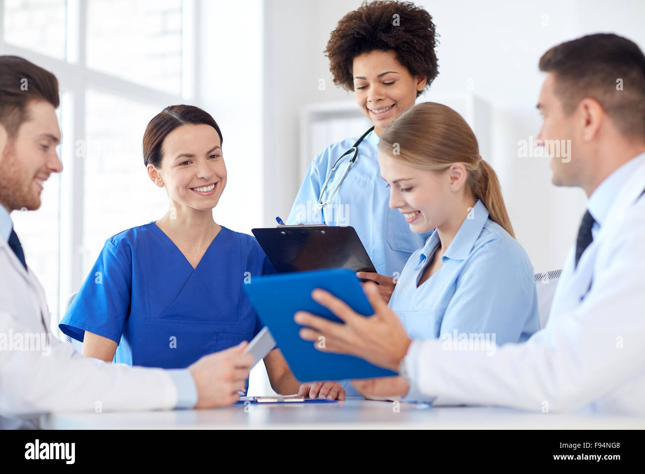 group of happy doctors meeting at hospital office Stock Photo - Alamy
