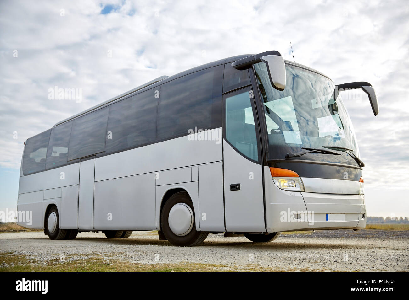 tour bus driving outdoors Stock Photo - Alamy