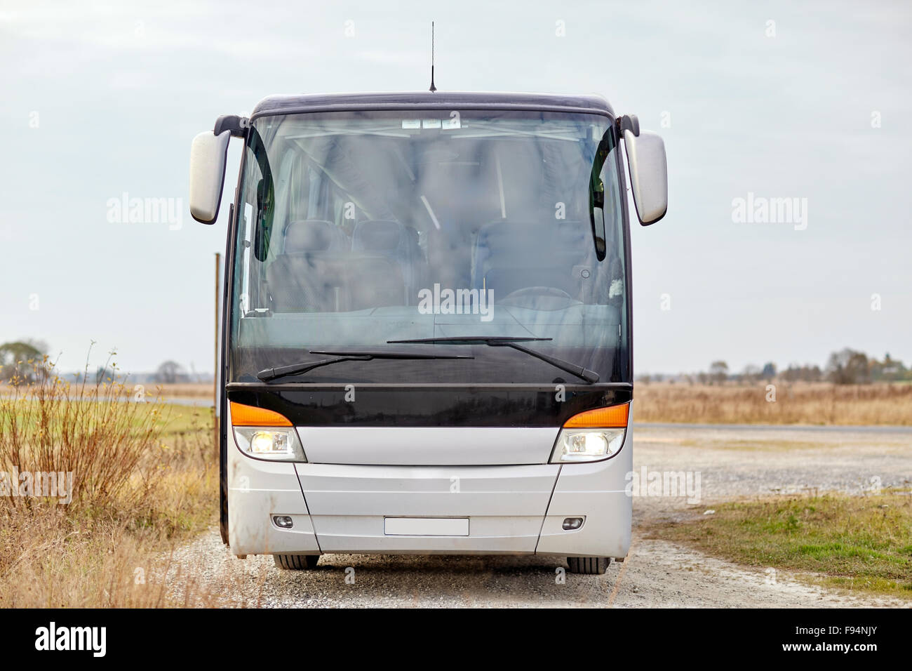 tour bus staying outdoors Stock Photo - Alamy