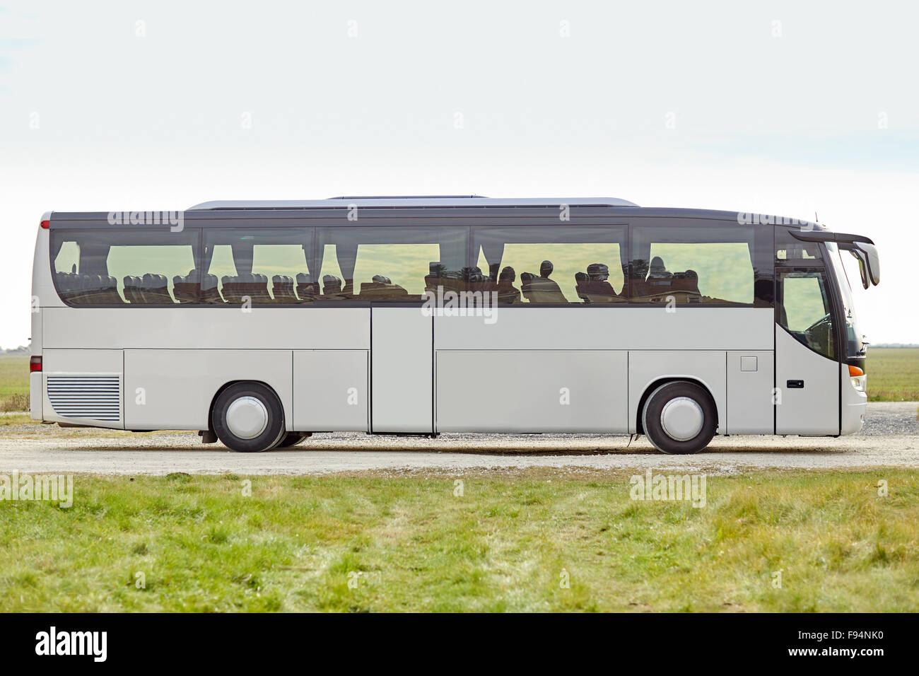 tour bus staying outdoors Stock Photo - Alamy