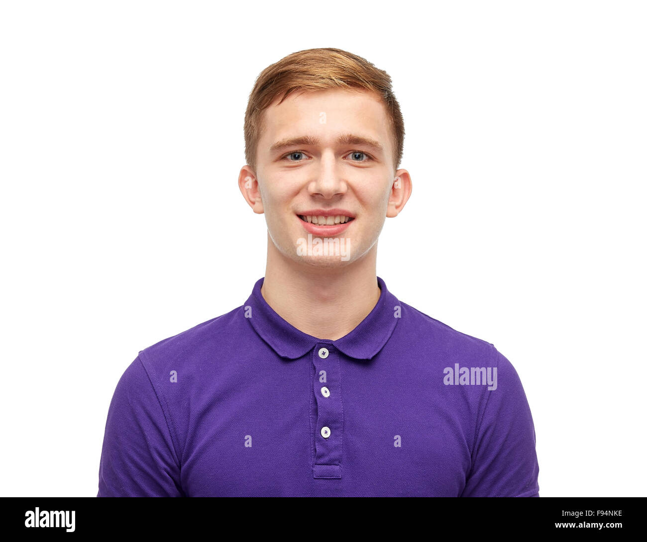 smiling young man in purple polo t-shirt Stock Photo - Alamy