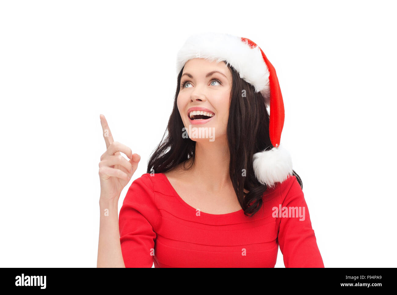 woman in santa helper hat pointing to something Stock Photo - Alamy