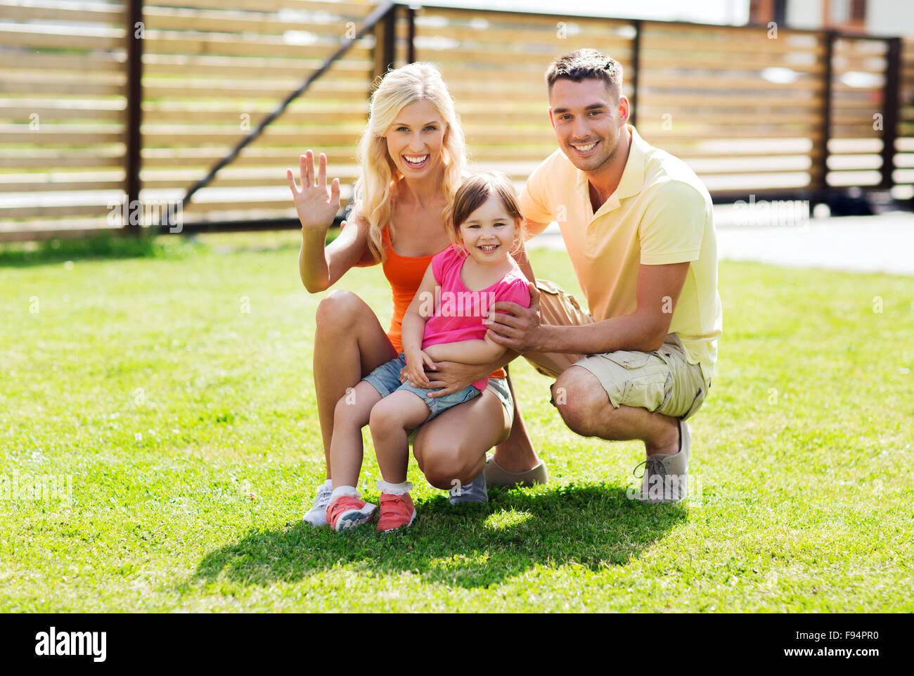 happy family hugging outdoors Stock Photo - Alamy