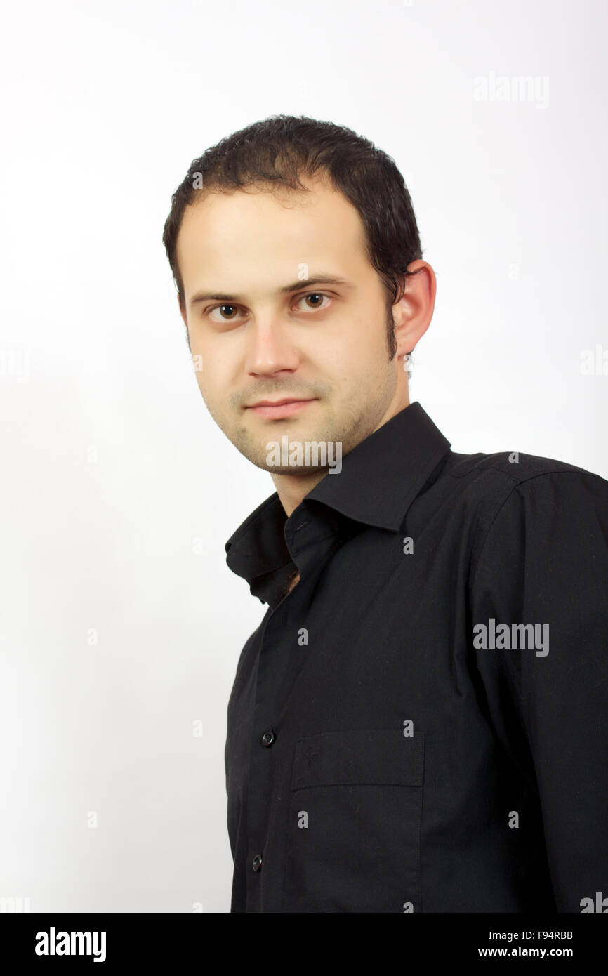 male model posing in trendy clothes on the white background Stock Photo ...
