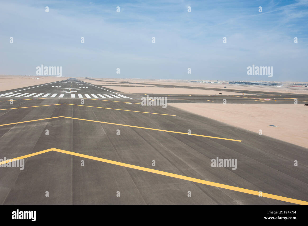 Aerial panoramic view of a commercial airport runway with connections ...
