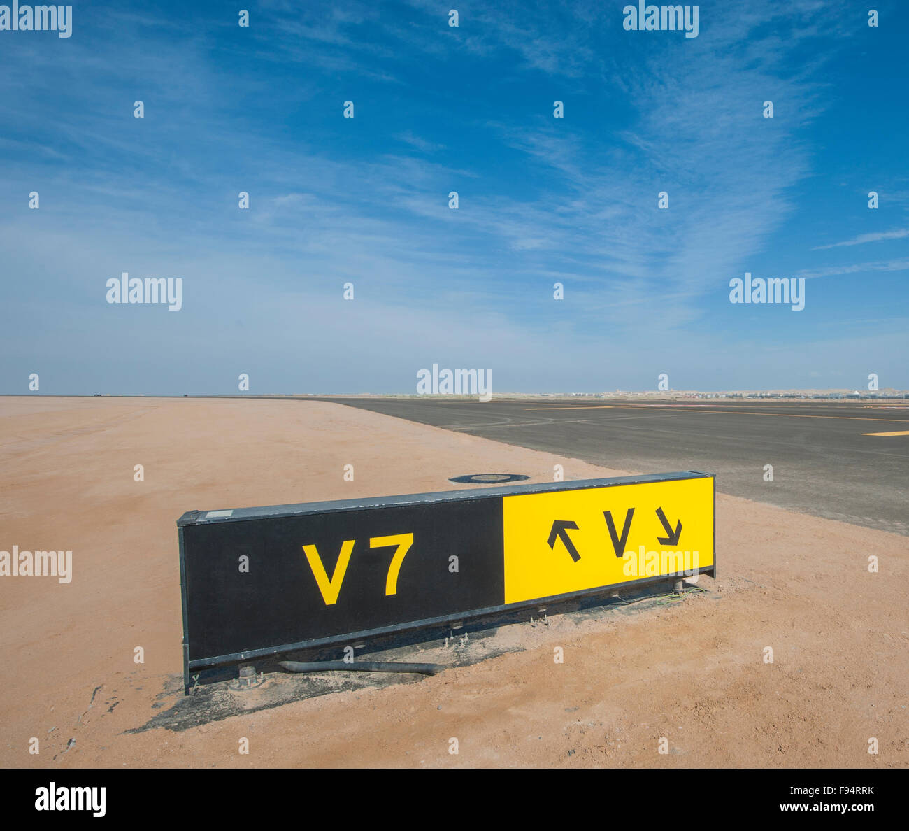 Directional sign markings by the runway at a commercial airport Stock ...