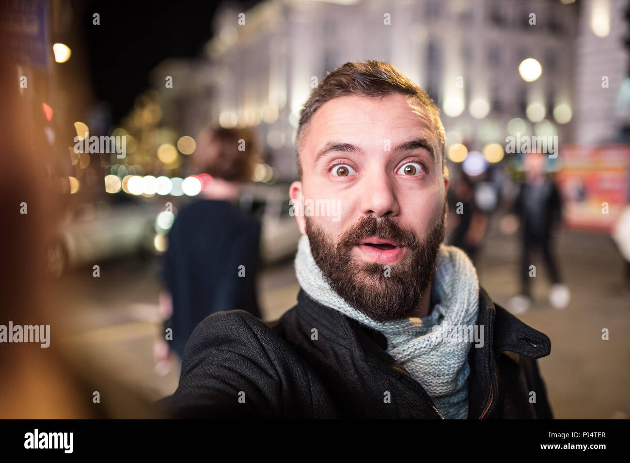 Young handsome man with coffee cup in London city Stock Photo - Alamy