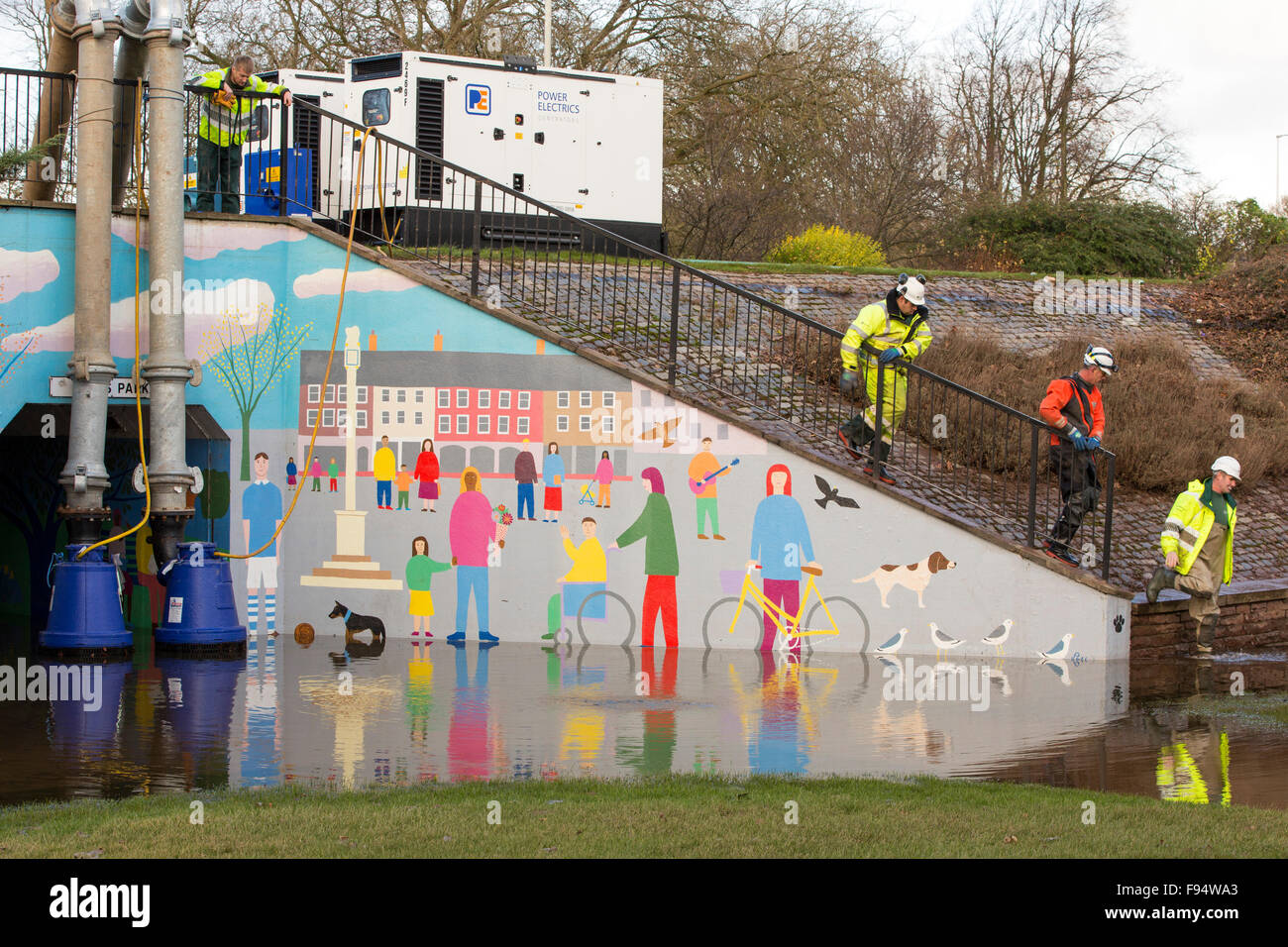 Environment Agency staff involved in pumping out floodwater from ...