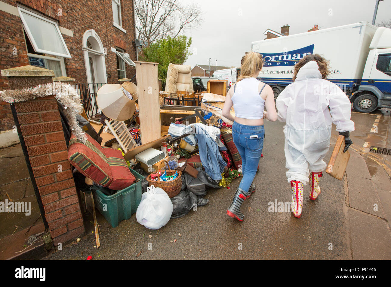 Jenny Kay removes flood damaged property from her house on Warwick Road ...