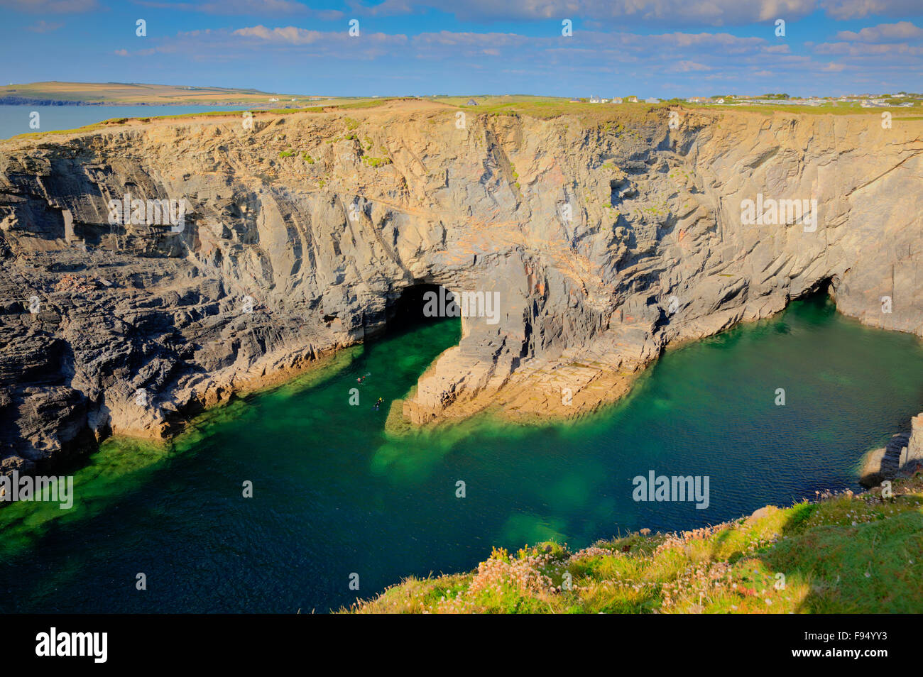 Beautiful Wine Cove Cornwall coast turquoise blue sea with snorkellers ...