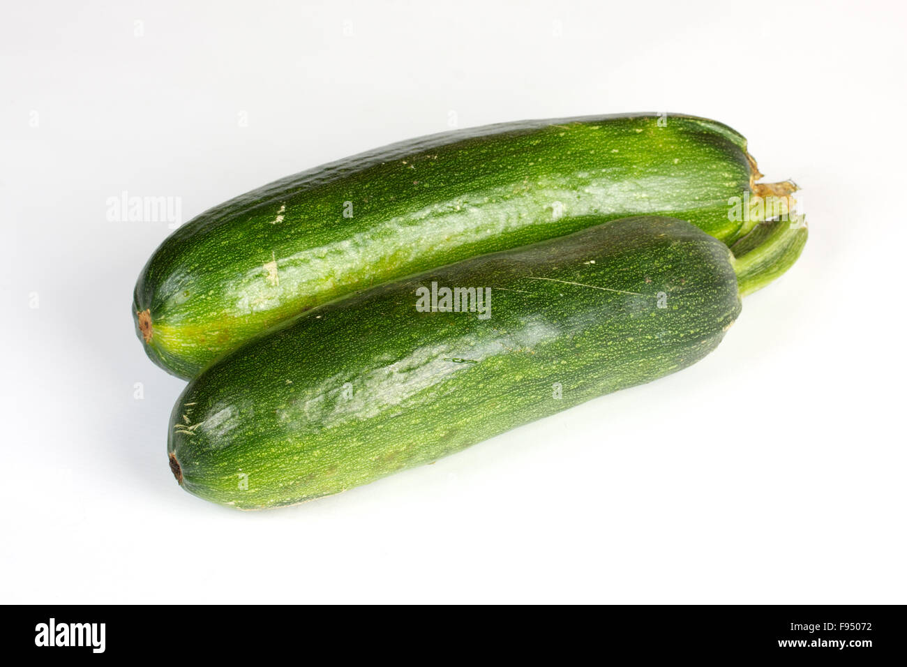 Zucchini isolated on white background Stock Photo - Alamy