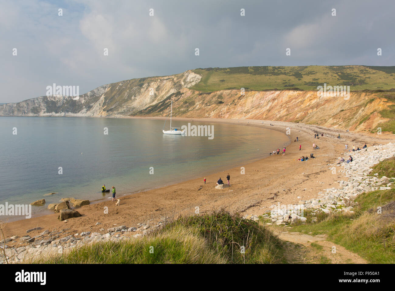Worbarrow Bay beach with people east of Lulworth Cove and near Tyneham ...