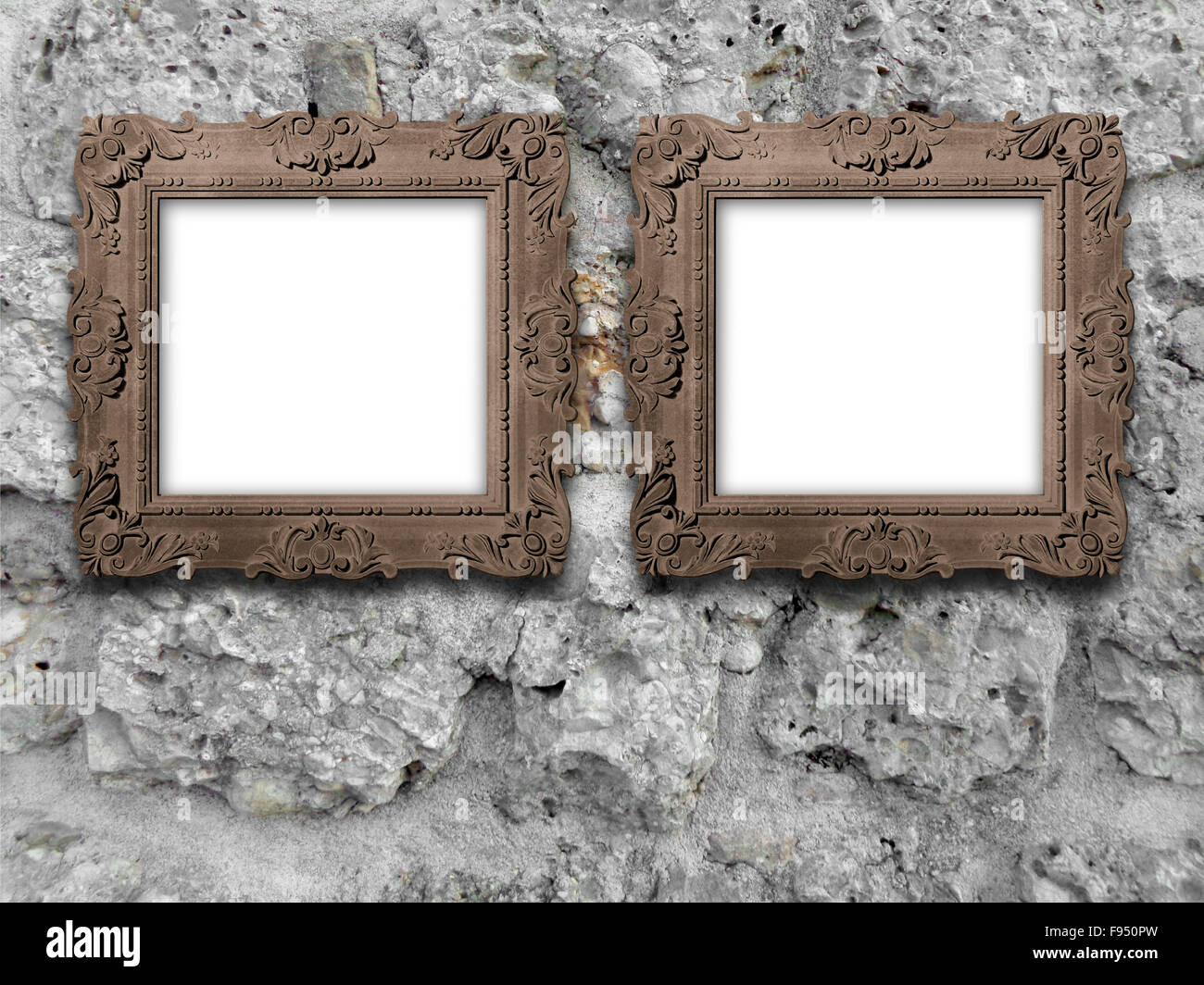 Two brown baroque frames on gray stone wall background Stock Photo - Alamy