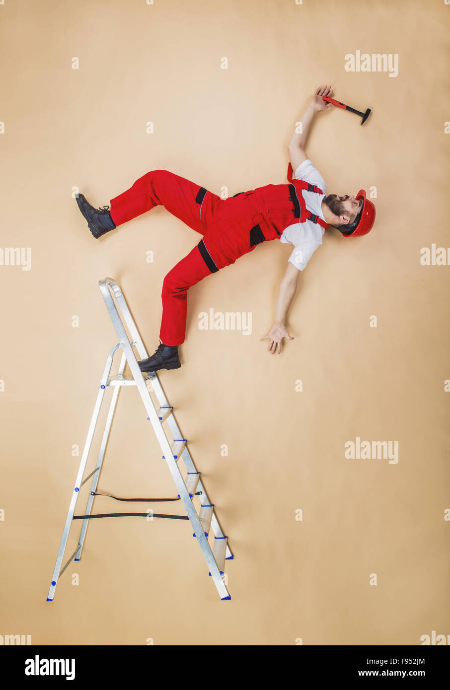 Worker falling of ladder hi-res stock photography and images - Alamy