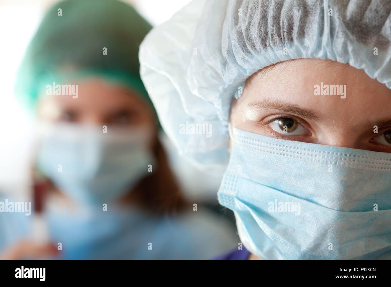 two young doctors in mask at clinic Stock Photo - Alamy