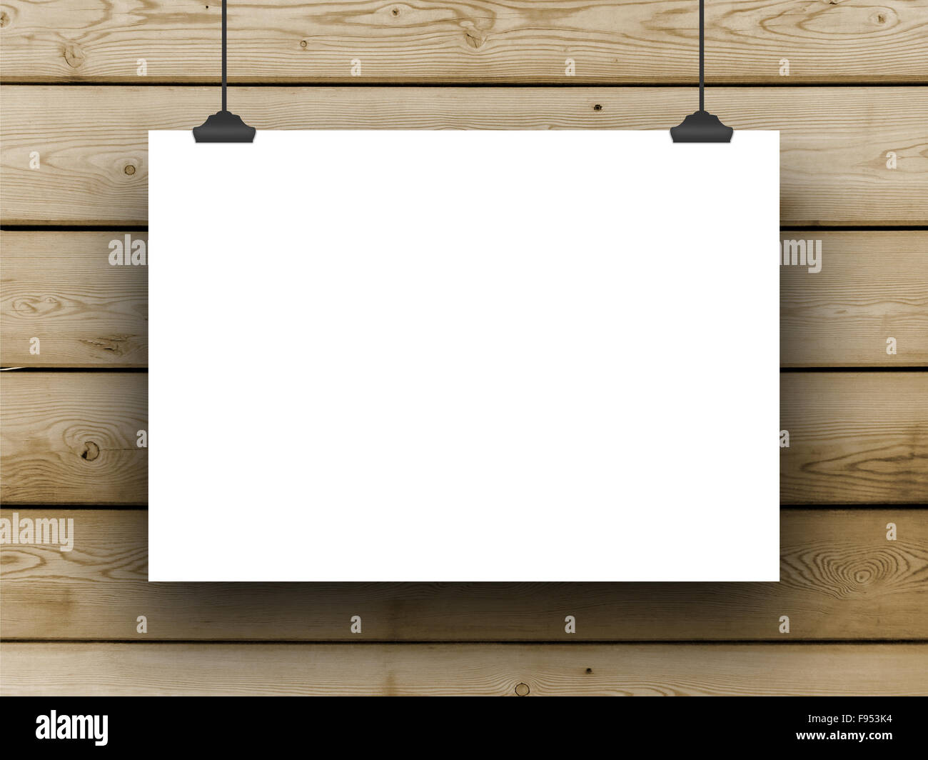 Single hanged horizontal paper sheet frame with clips on brown wooden ...