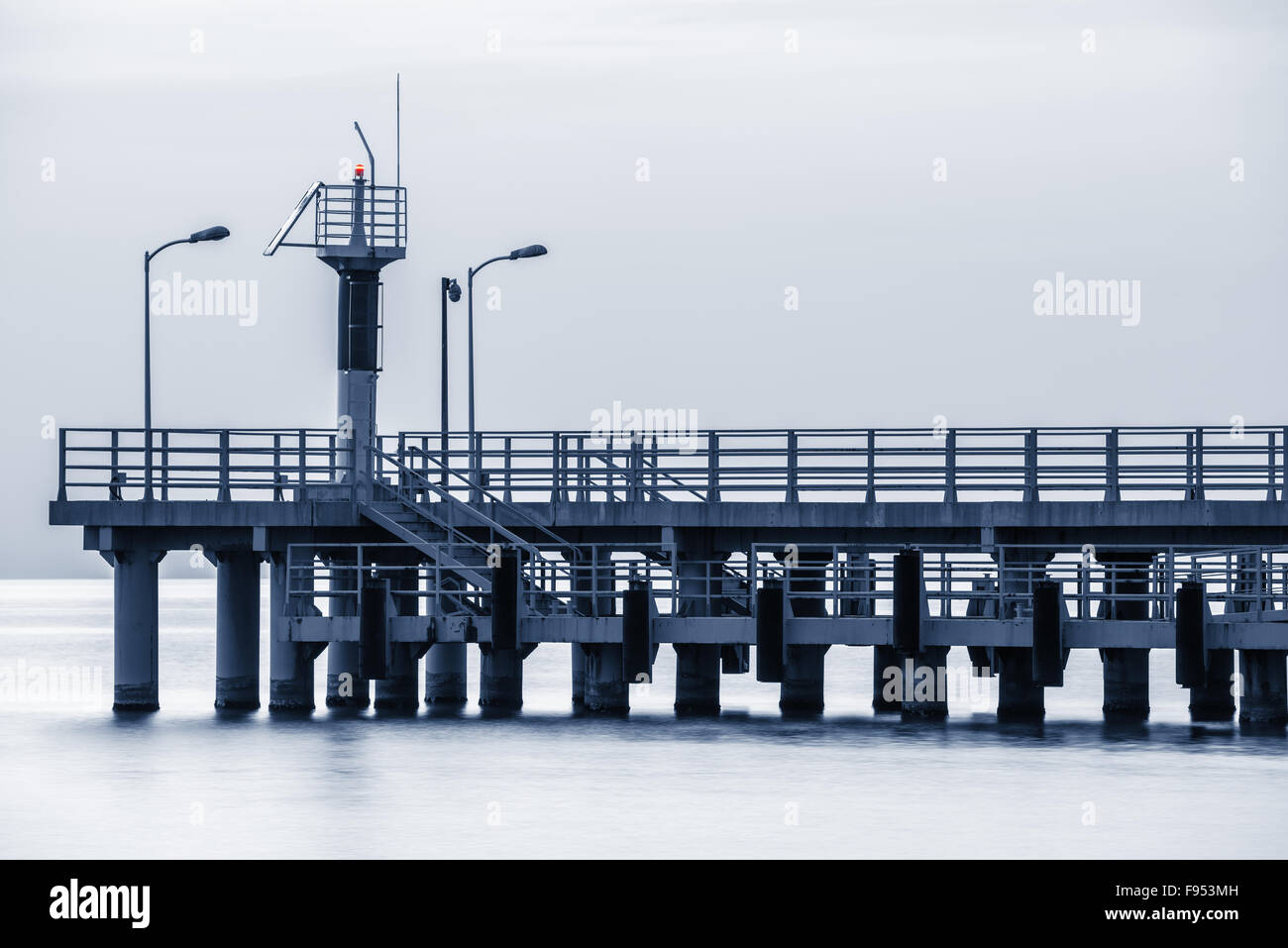 View of the pier at evening time Stock Photo - Alamy