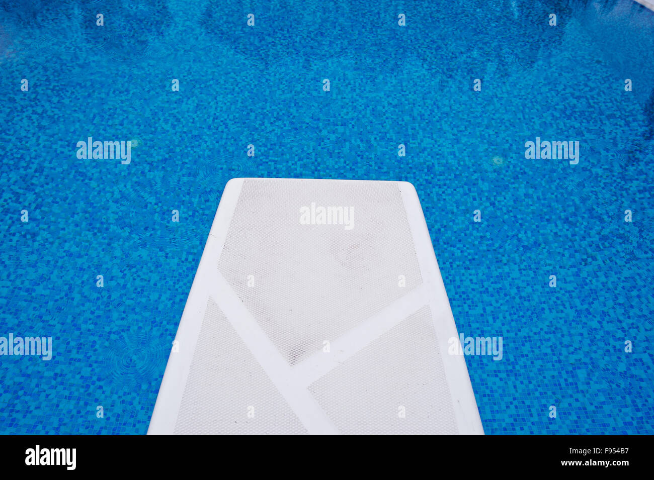 Springboard in the pool Stock Photo - Alamy