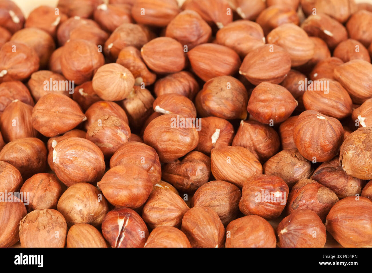 Closeup hazelnuts. Can be used as background Stock Photo - Alamy
