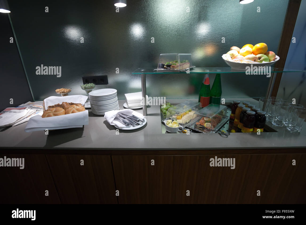 Buffet with cutlery and dessert Stock Photo - Alamy