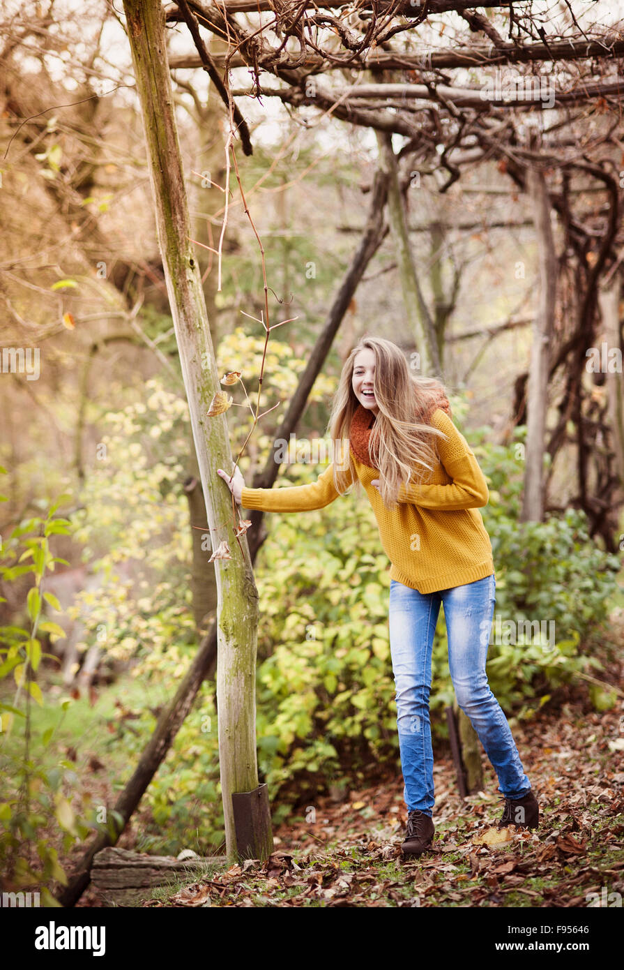 Outdoor portrait of beautiful girl in autumn forest Stock Photo - Alamy