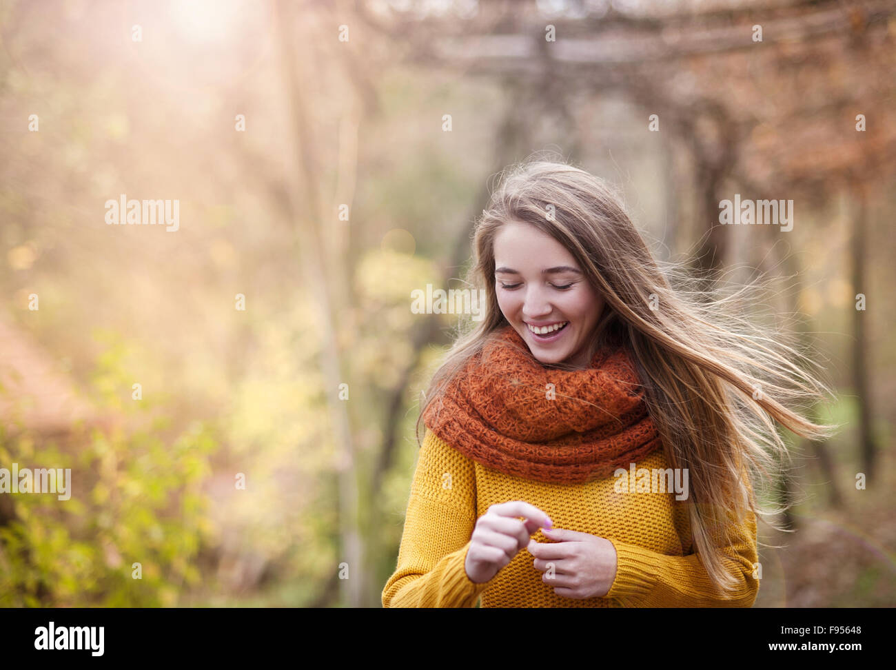 Outdoor portrait of beautiful girl in autumn forest Stock Photo - Alamy