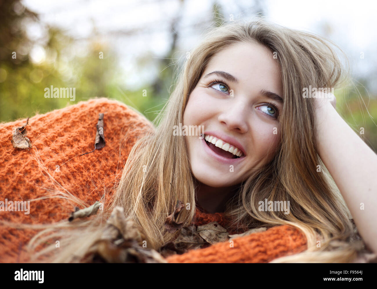Outdoor portrait of beautiful girl in autumn forest Stock Photo - Alamy