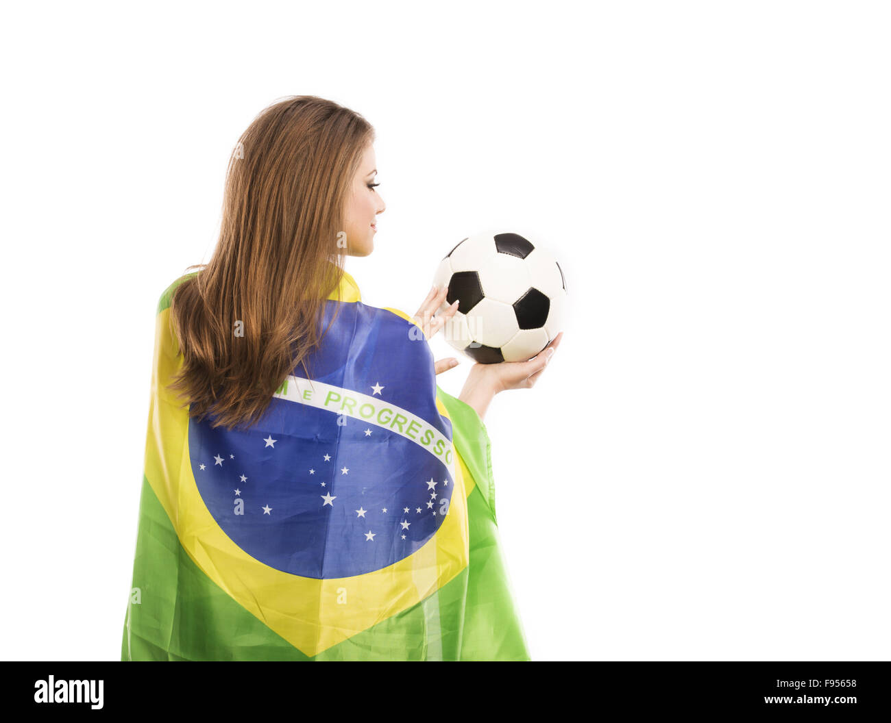 Beautiful female fan with brazilian flag holding a soccer ball isolated ...