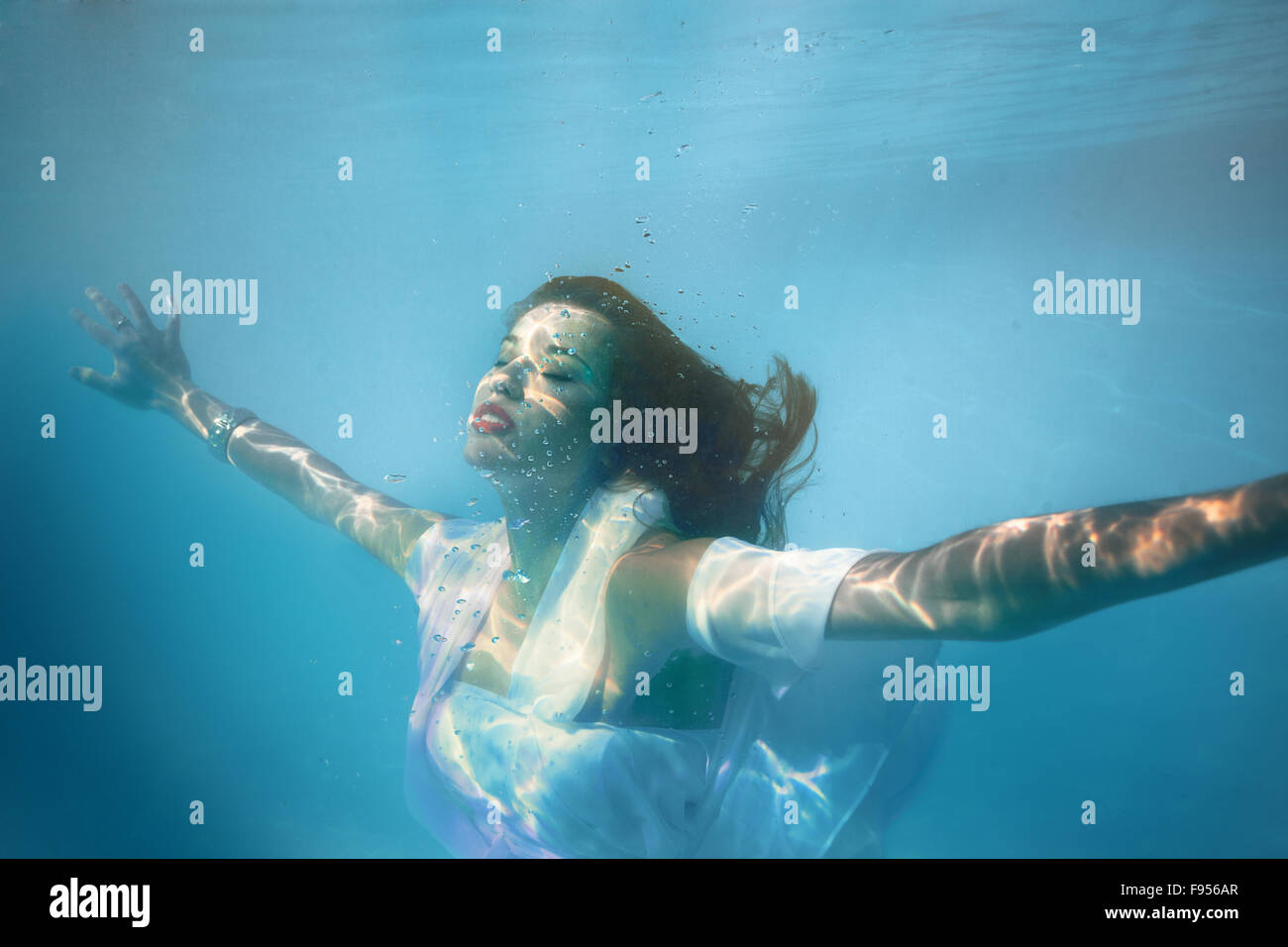 Person underwater shadow hi-res stock photography and images - Alamy