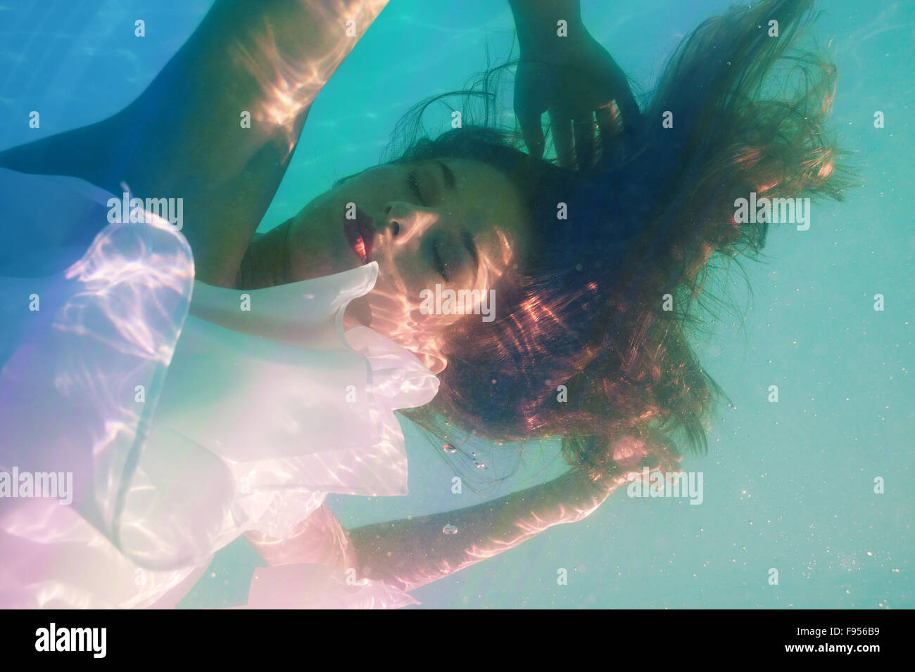 Female dress underwater hi-res stock photography and images - Alamy