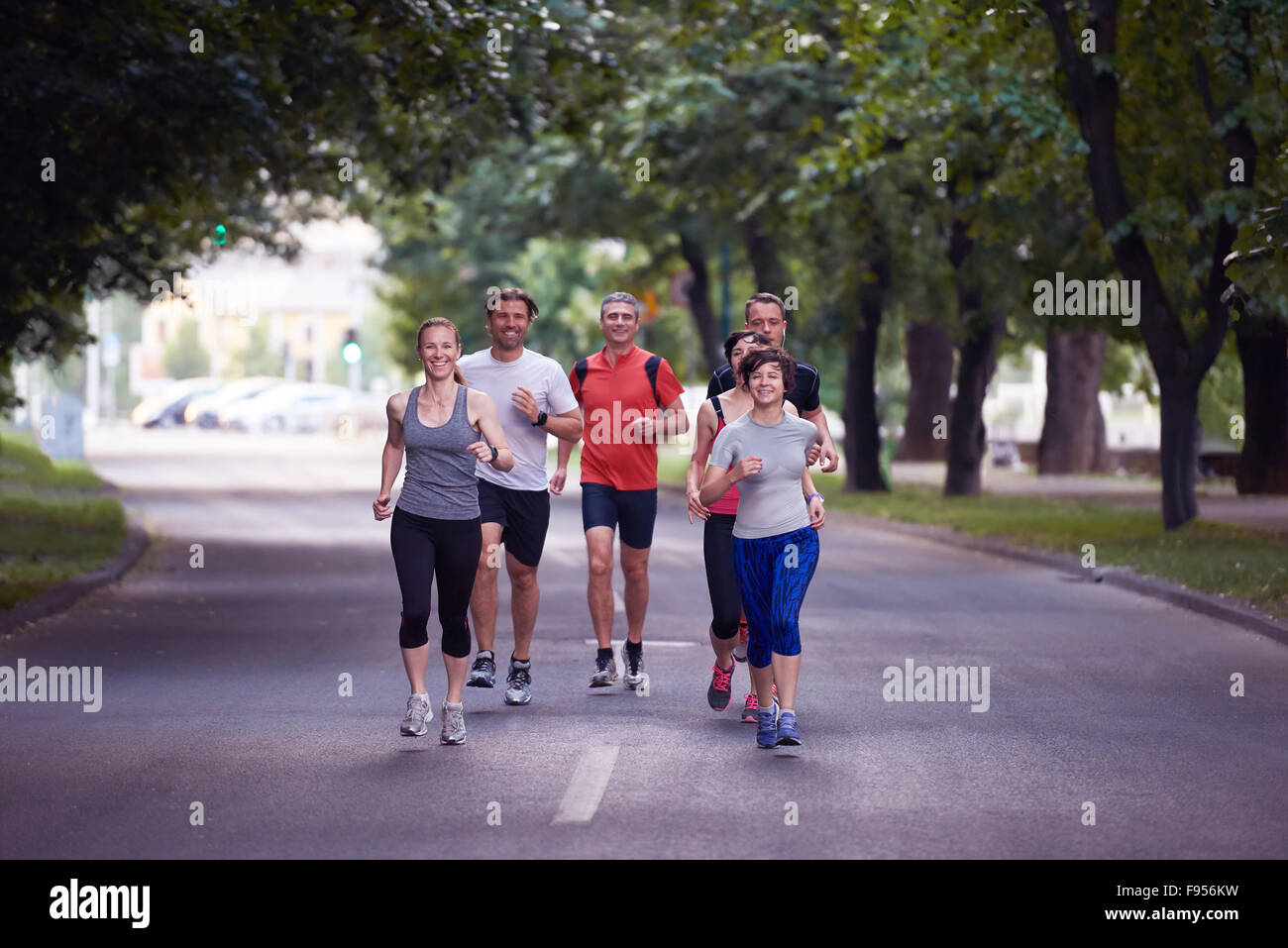 people group jogging, runners team on morning training Stock Photo - Alamy