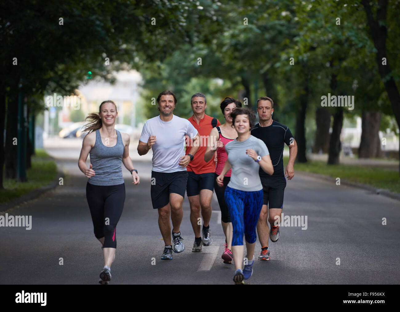 people group jogging, runners team on morning training Stock Photo - Alamy