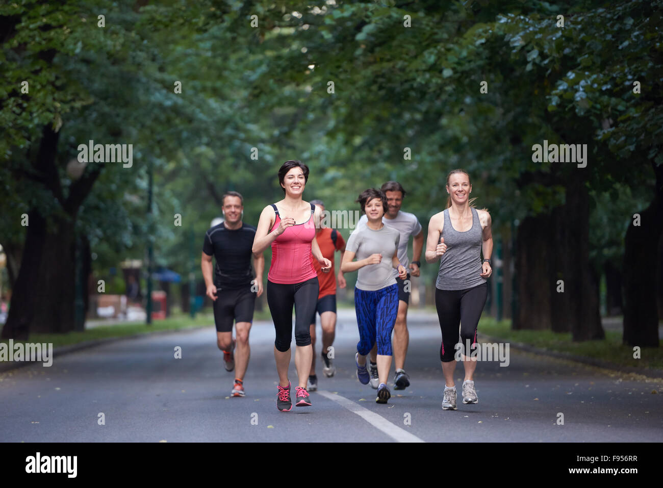 people group jogging, runners team on morning training Stock Photo - Alamy
