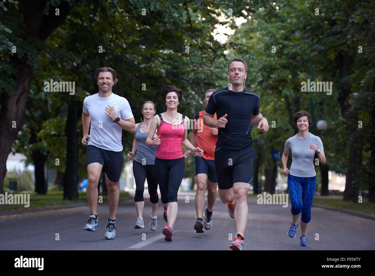 people group jogging, runners team on morning training Stock Photo - Alamy