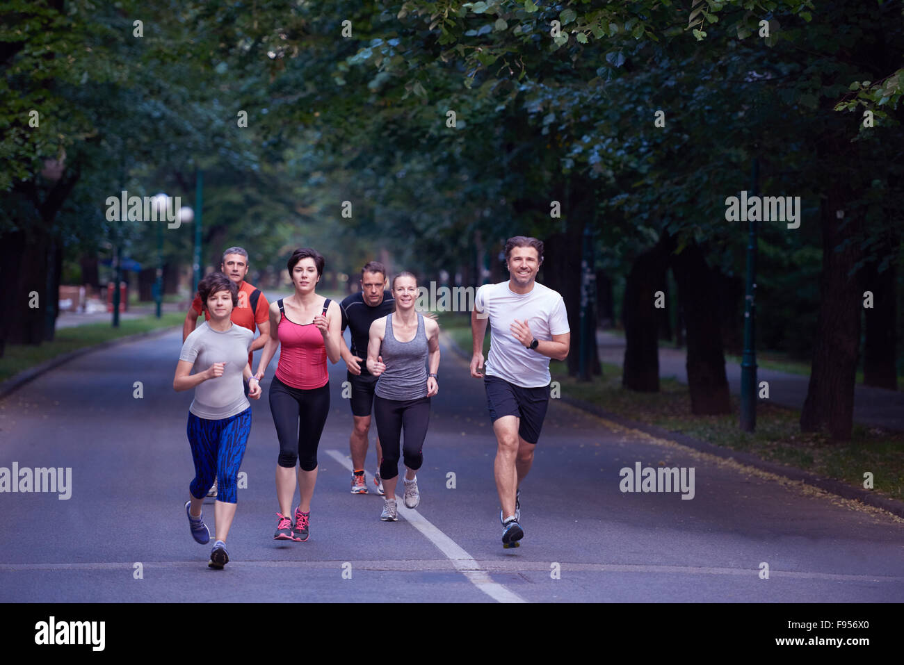 people group jogging, runners team on morning training Stock Photo - Alamy